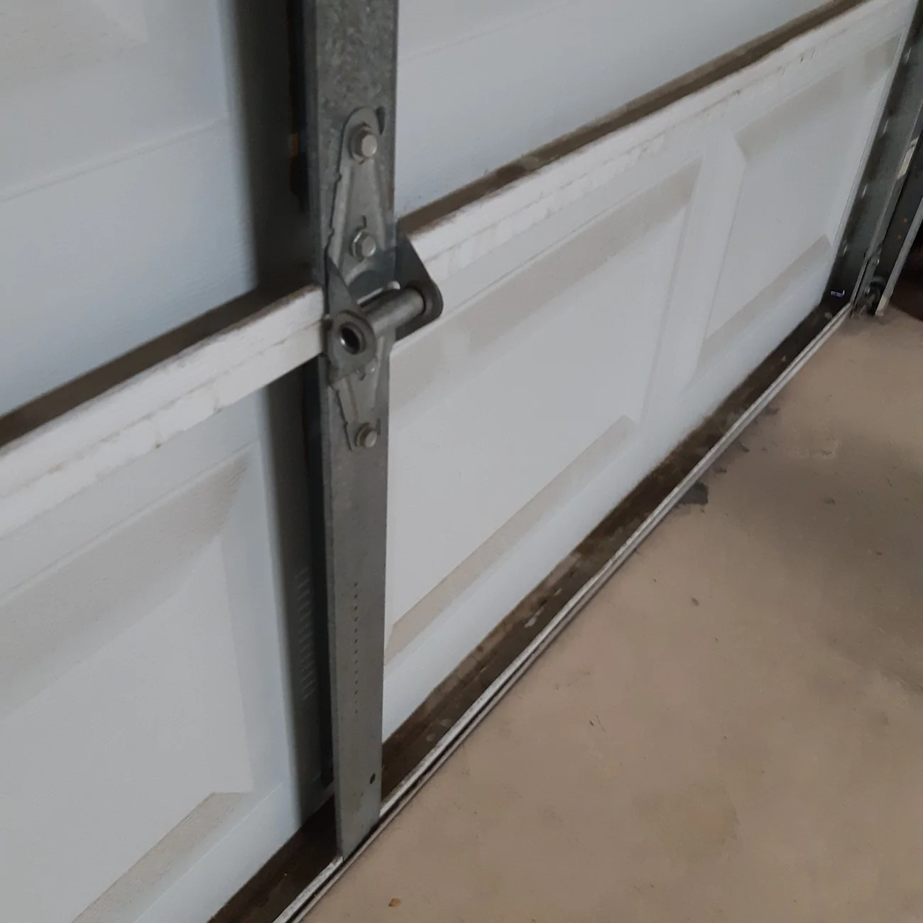 Light scratches from garage door scuffing rear bumper ...