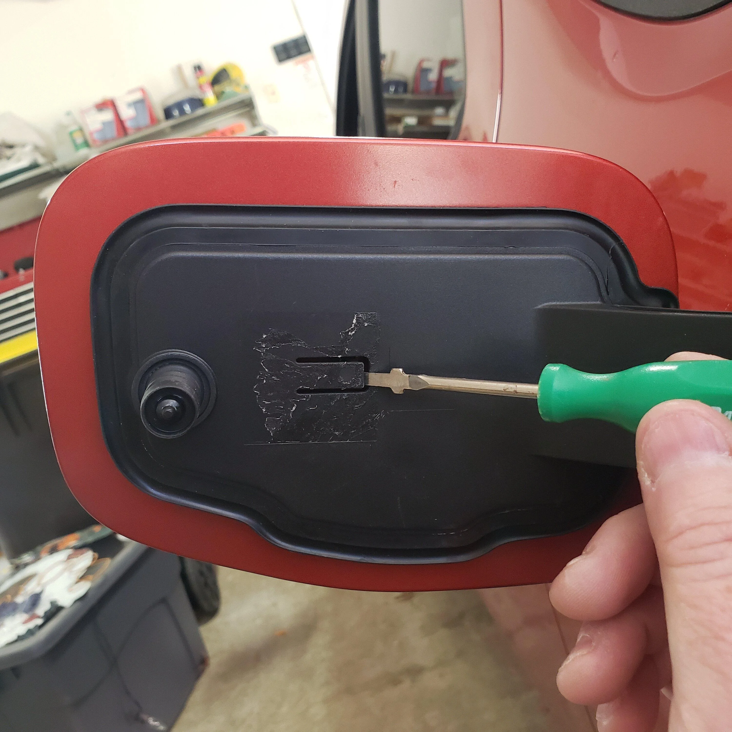 HOW TO remove your fuel filler cover and replace your fuel door pin ...