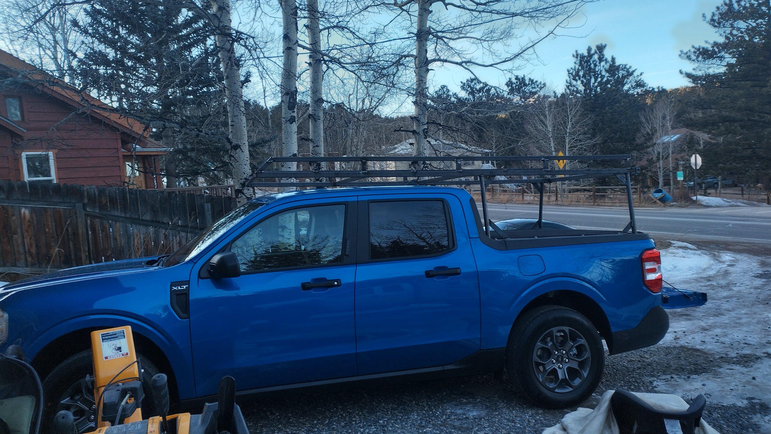 Finally got my maverick! New roof rack and tonneau done today ...